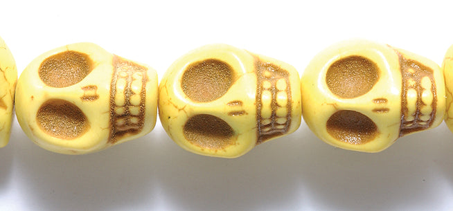 ST50-Y: Skulls Magnesite Yellow 13x18mm – Shipwreck Beads